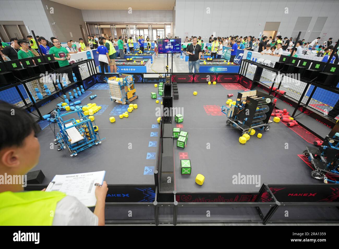 YANTAI, CHINA - JUNE 29, 2023 - Participants compete in the MakeX robot ...