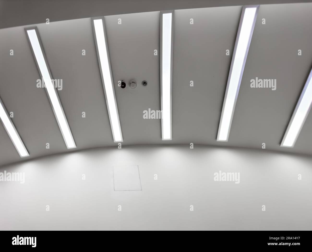 Lights and ventilation system in long line on ceiling of the industrial ...