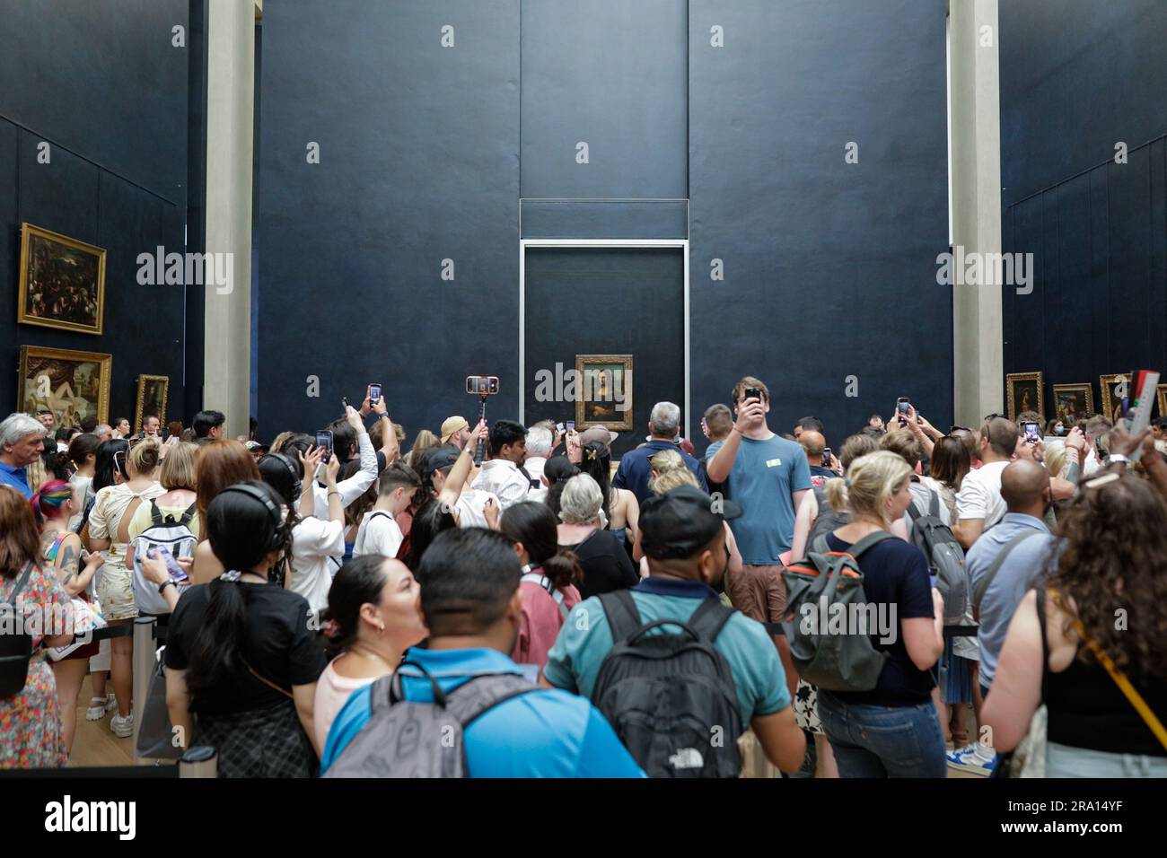 Paris, France - June 9, 2023: Tourists crowd to take photos of the ...
