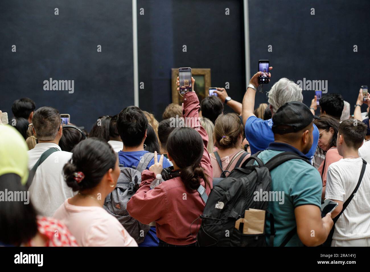 Paris, France - June 9, 2023: Tourists crowd to take photos of the ...