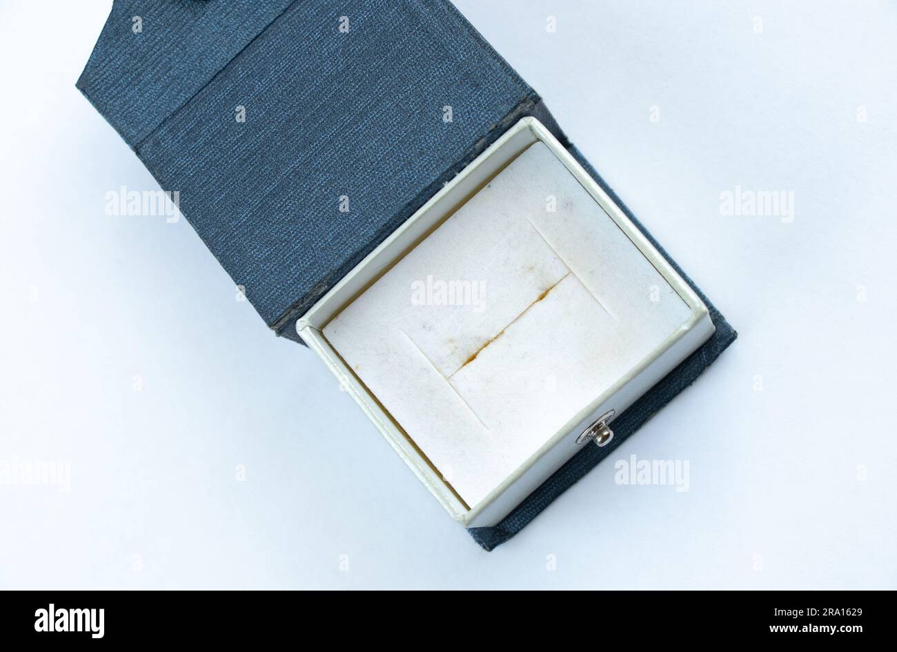 empty cardboard dirty blue box for a ring on a white Stock Photo - Alamy