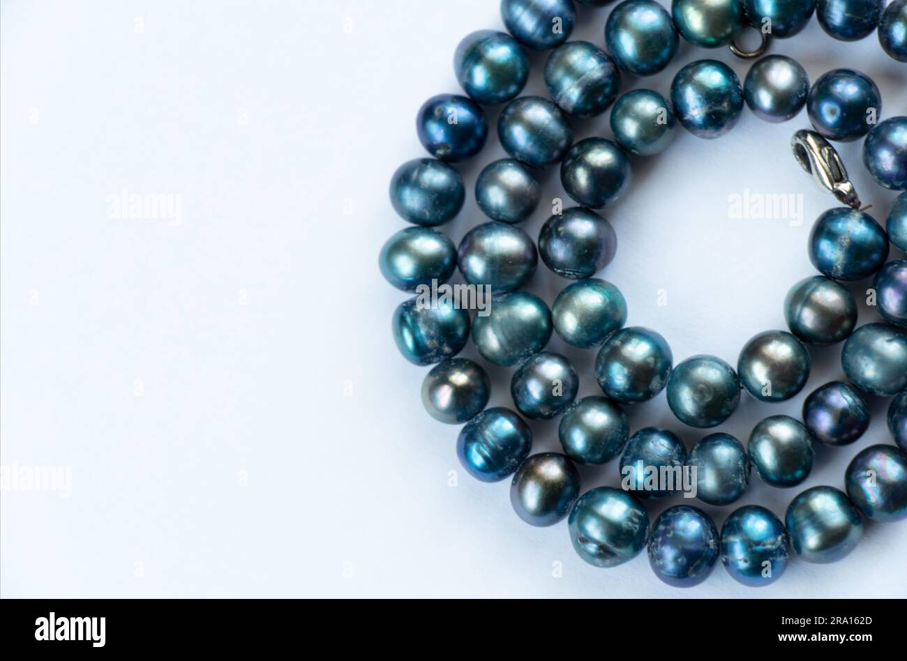 pearl female beads on an isolated background Stock Photo - Alamy