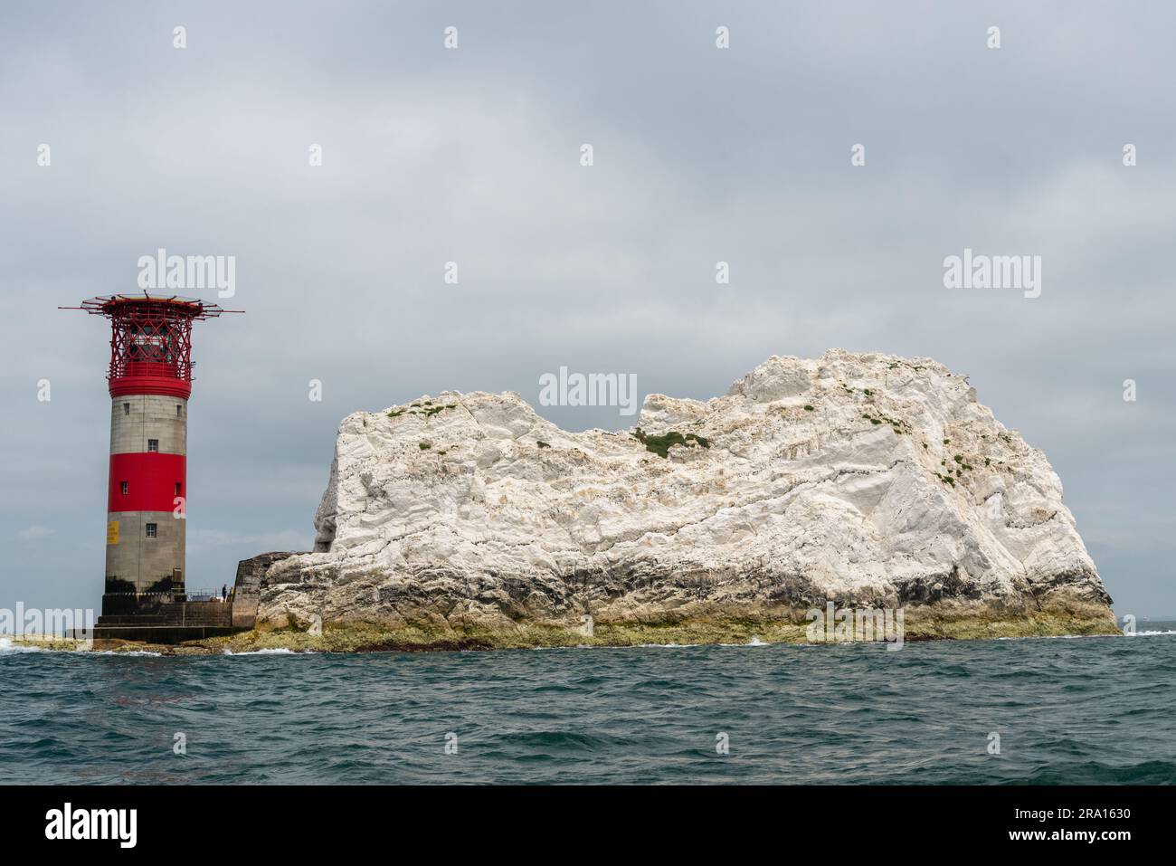 The Needles lighthouse on the Isle of Wight taken from close up passing ...