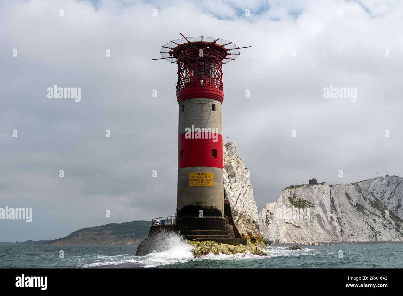 The Needles lighthouse on the Isle of Wight taken from close up passing ...