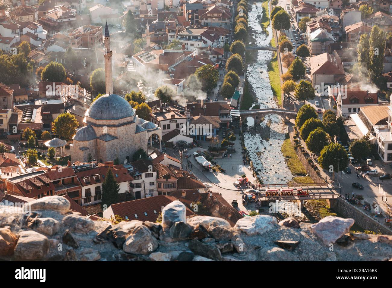 the 17th century Sinan Pasha mosque and old stone bridge over the ...