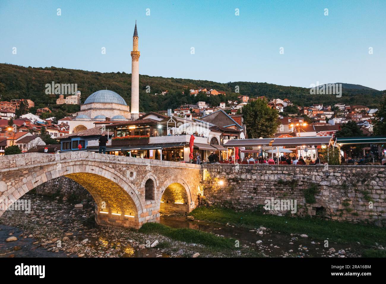 the 17th century Sinan Pasha mosque and old stone bridge in Prizren ...