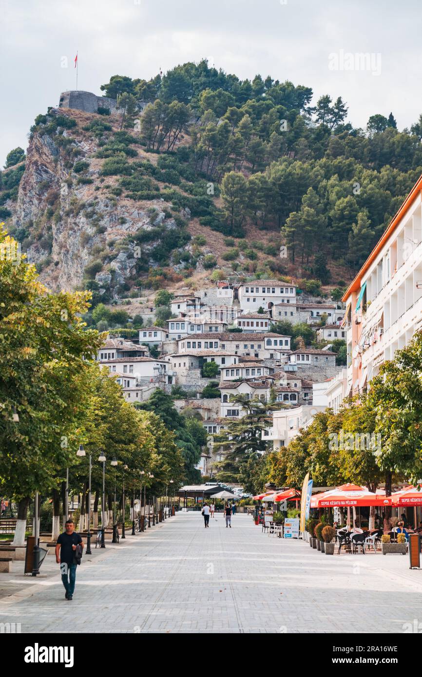 cafes and restaurants line the main pedestrian street in the city of ...