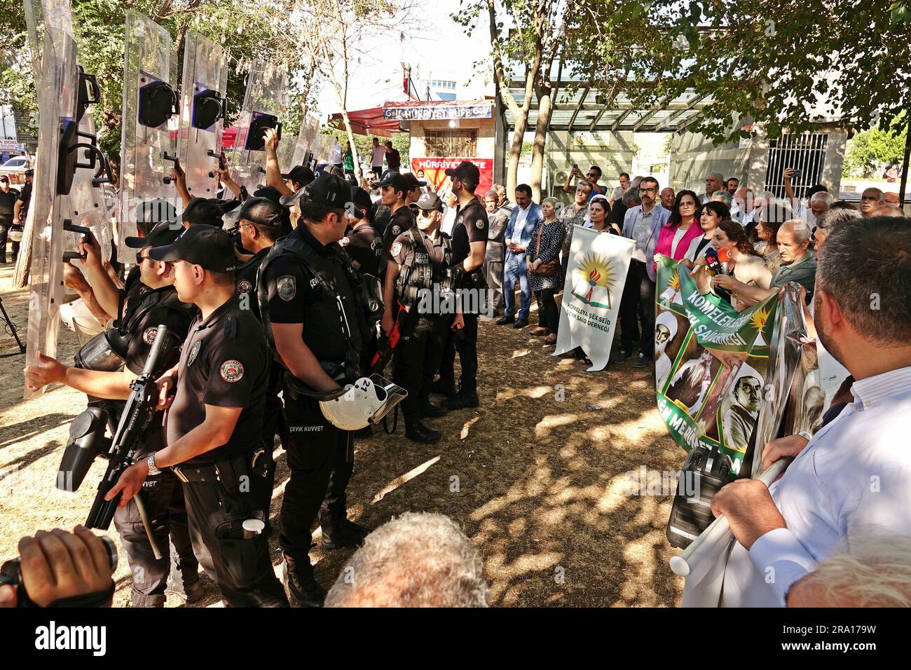 Turkish police blocked the way for media members with their shields and ...