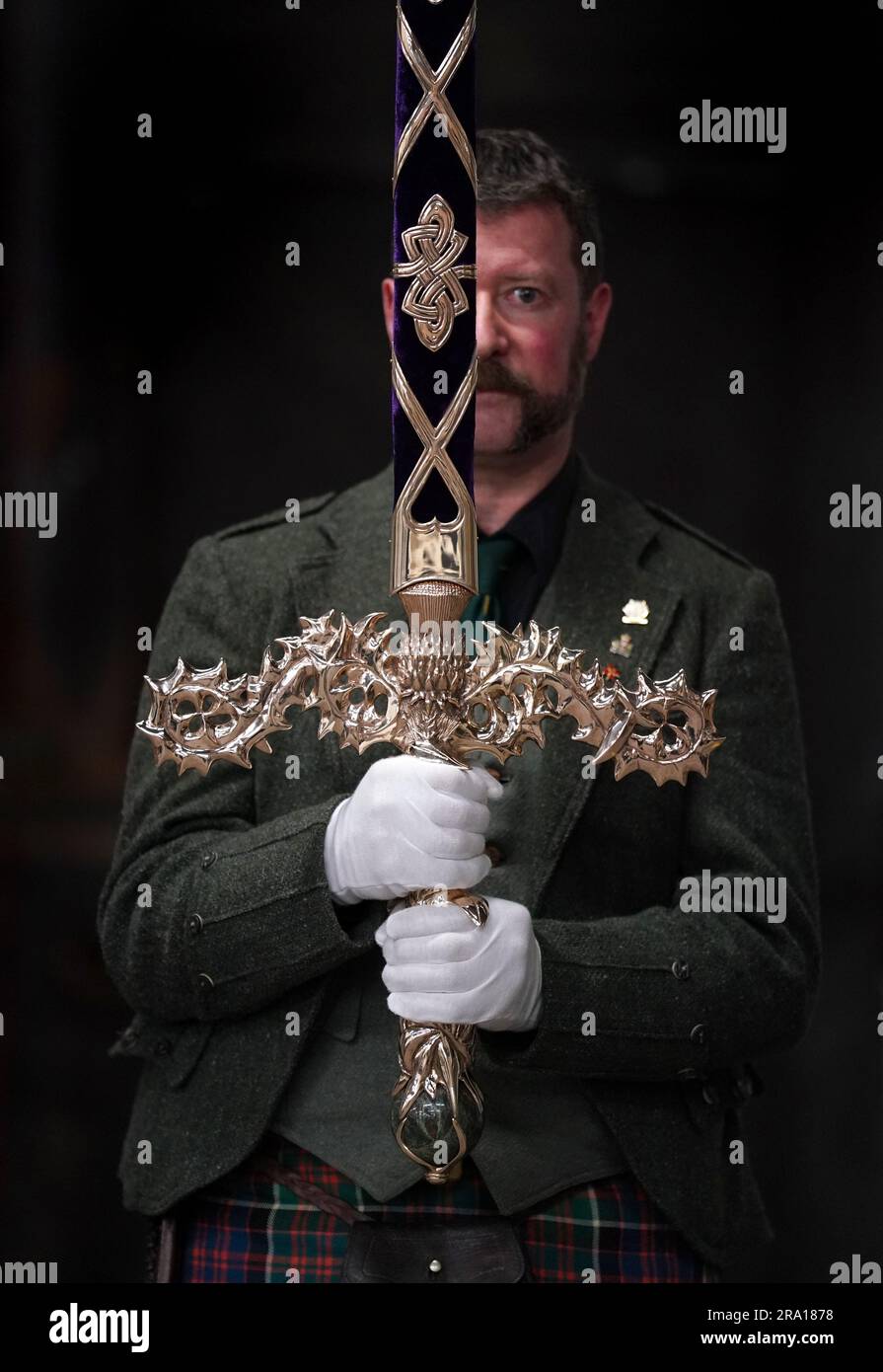 Paul Macdonald, custom sword and knife maker holds the Elizabeth sword ...