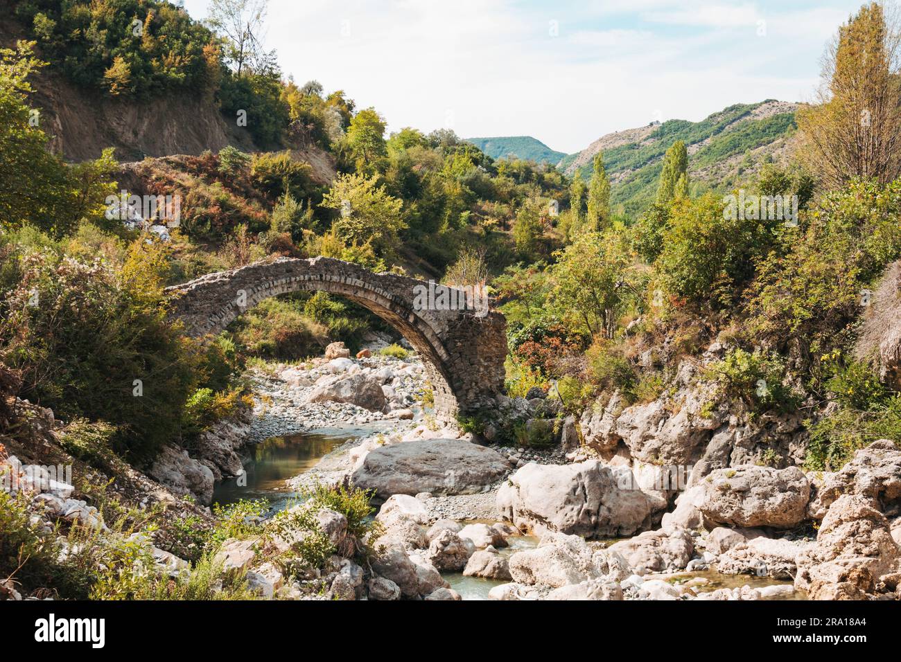 the remnants of an historic Ottoman bridge, over the Zeza River near ...