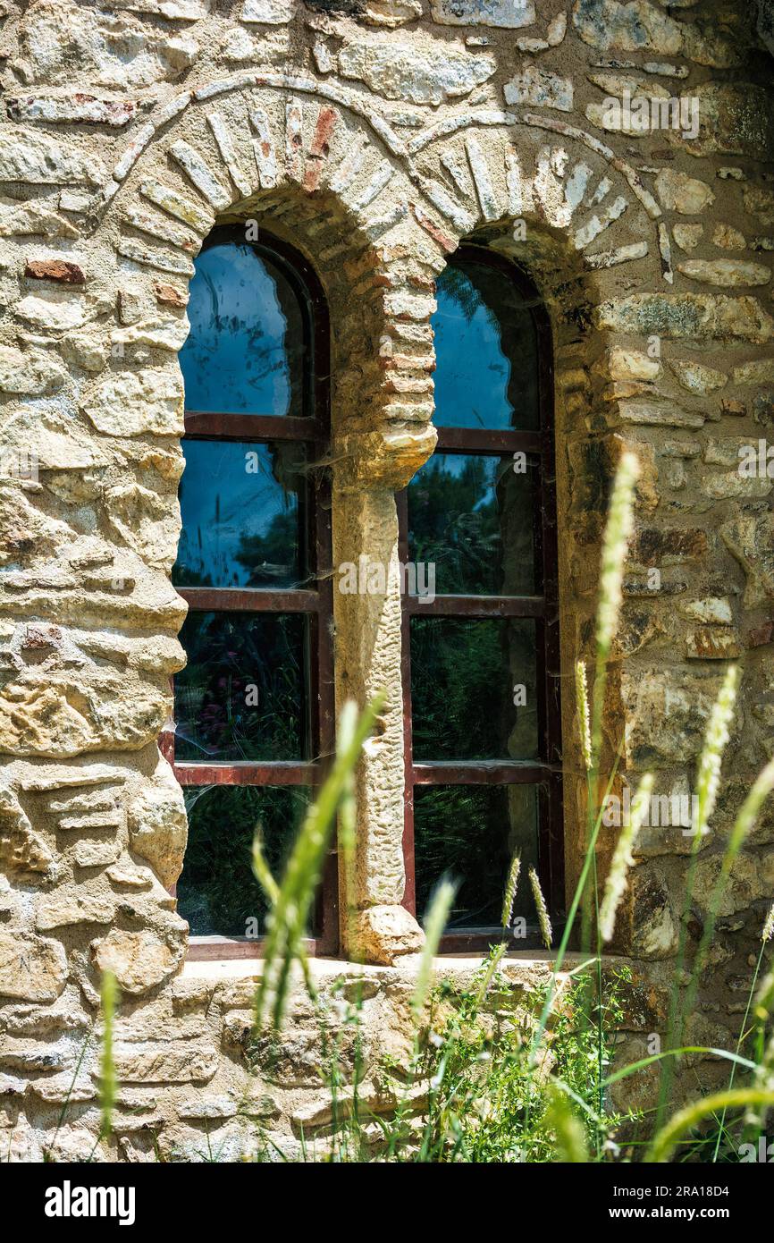 View of an Orthodox monastery enclosed by Davelis cave in Penteli, a ...
