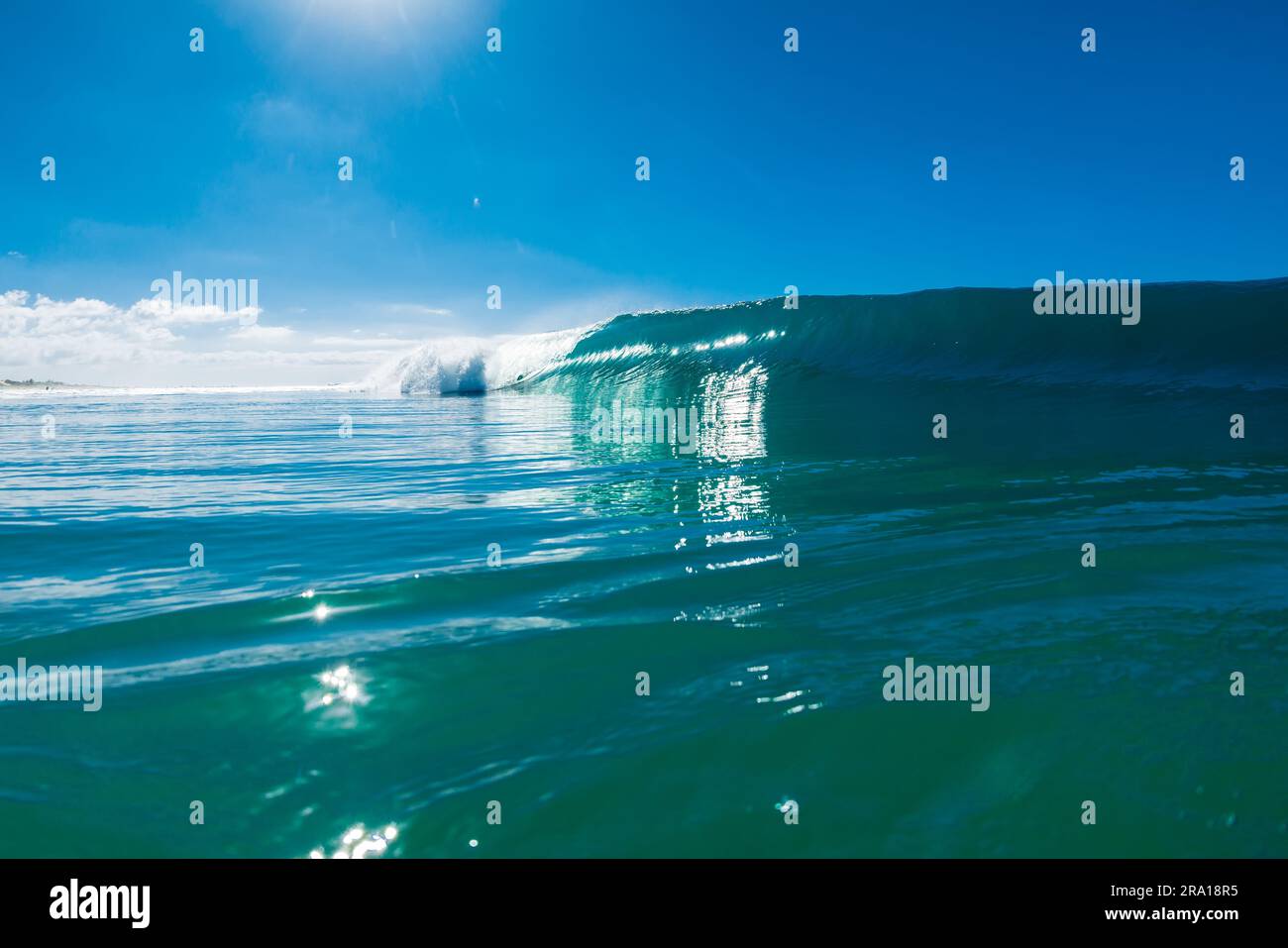 Turquoise perfect waves in ocean. Breaking wave ideal for surfing Stock ...