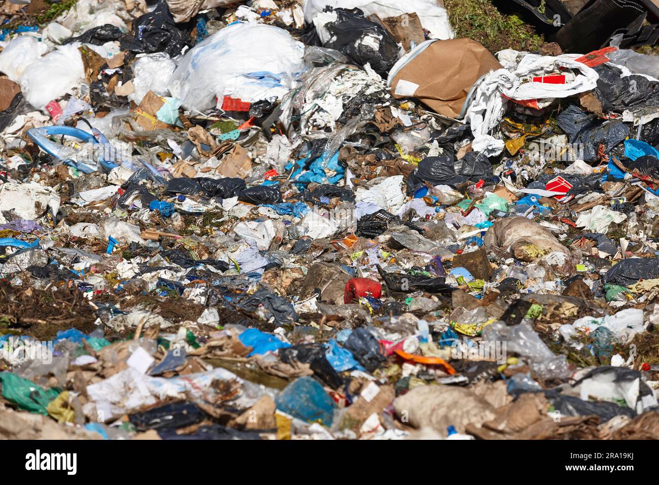 Open air garbage dump. Plastic pollution. Recycling junk. Consumerism ...