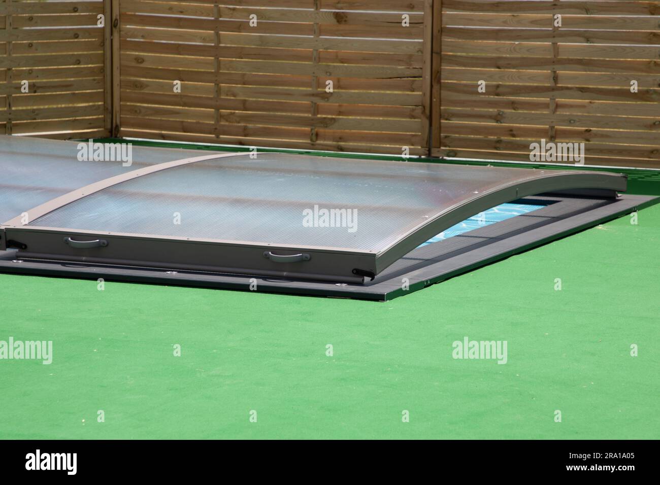 Outdoor swimming pool with a shelter roof retractable modern detail ...