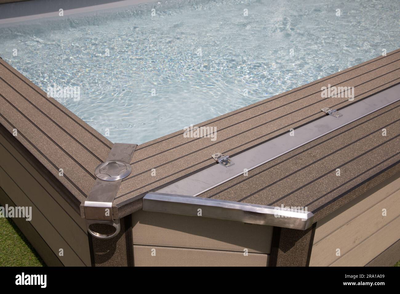 Detail of house garden spa modern pool water jet Stock Photo - Alamy