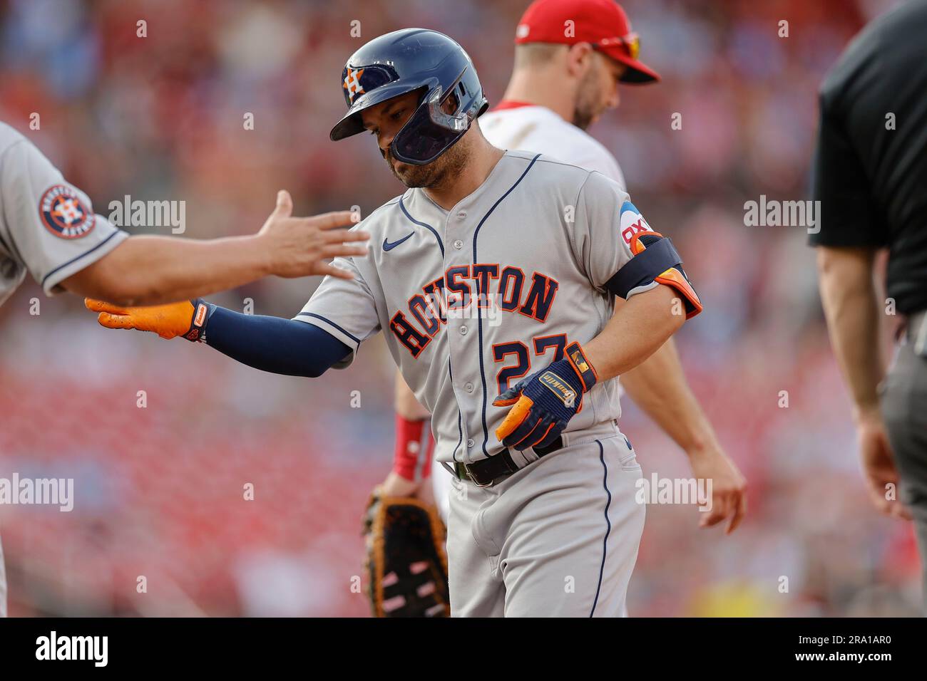 St. Louis, MO. USA; Houston Astros second baseman Jose Altuve (27) is congratulated by first ...