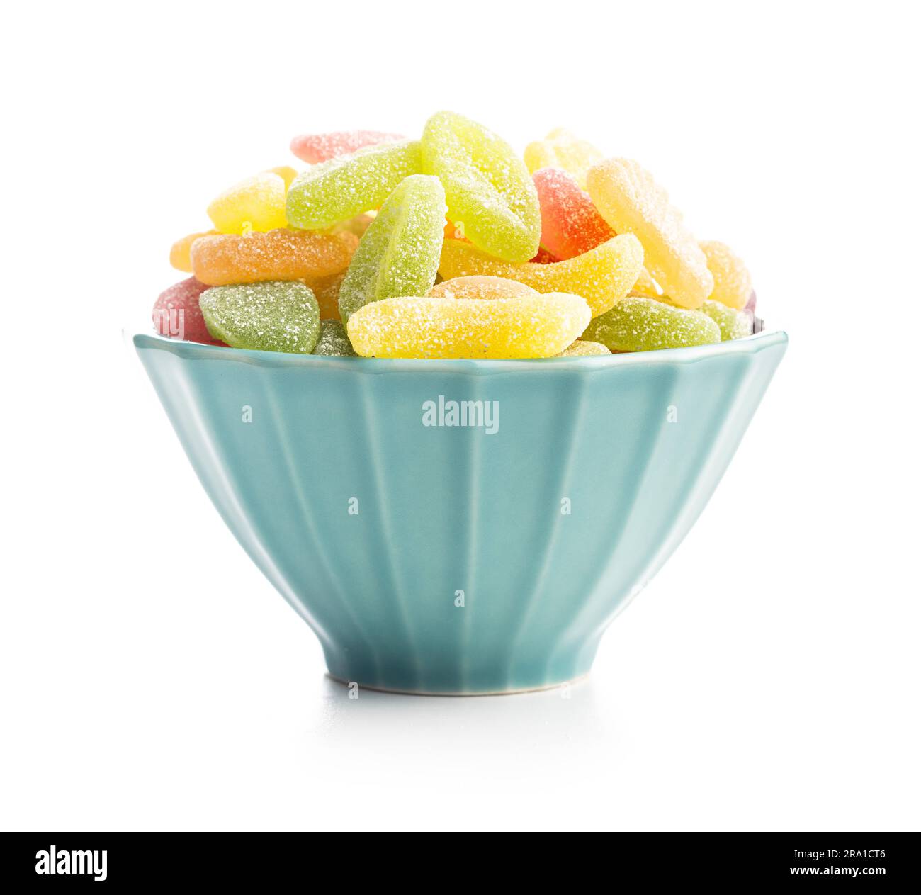 Mix of fruity jelly candy in bowl isolated on the white background ...