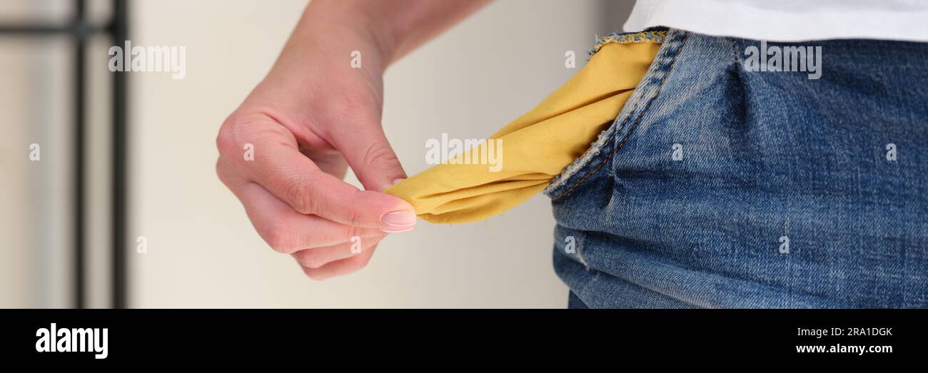 Man turning inside and showing empty pocket Stock Photo - Alamy