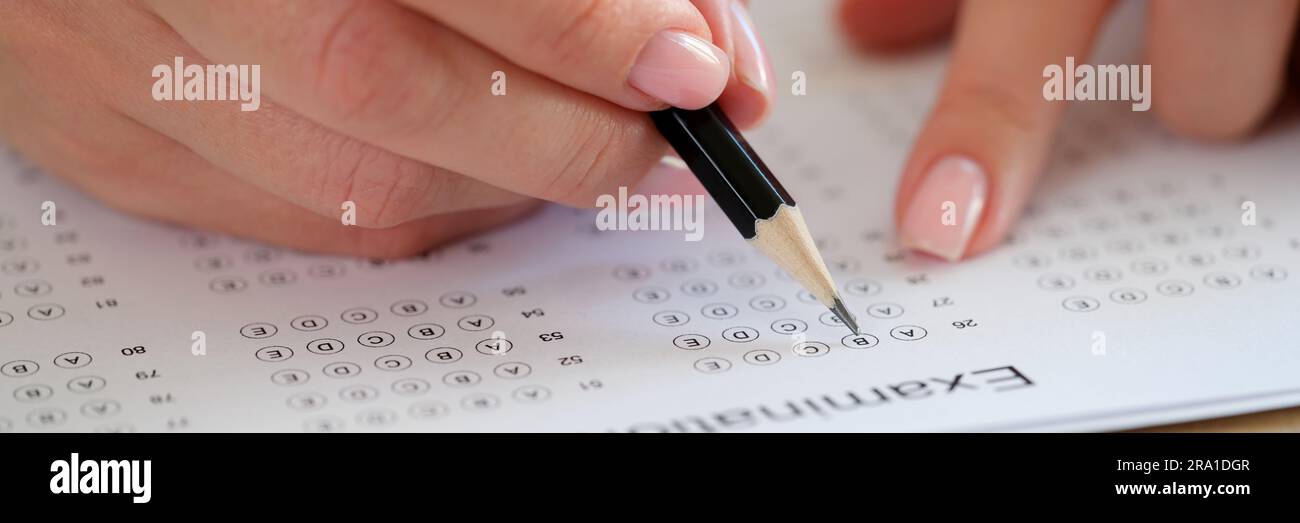 Student holding sheet paper hi-res stock photography and images - Alamy