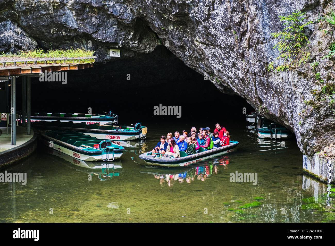 Tourists foot walk in the Punkva (Punkevni) Caves decorated with ...