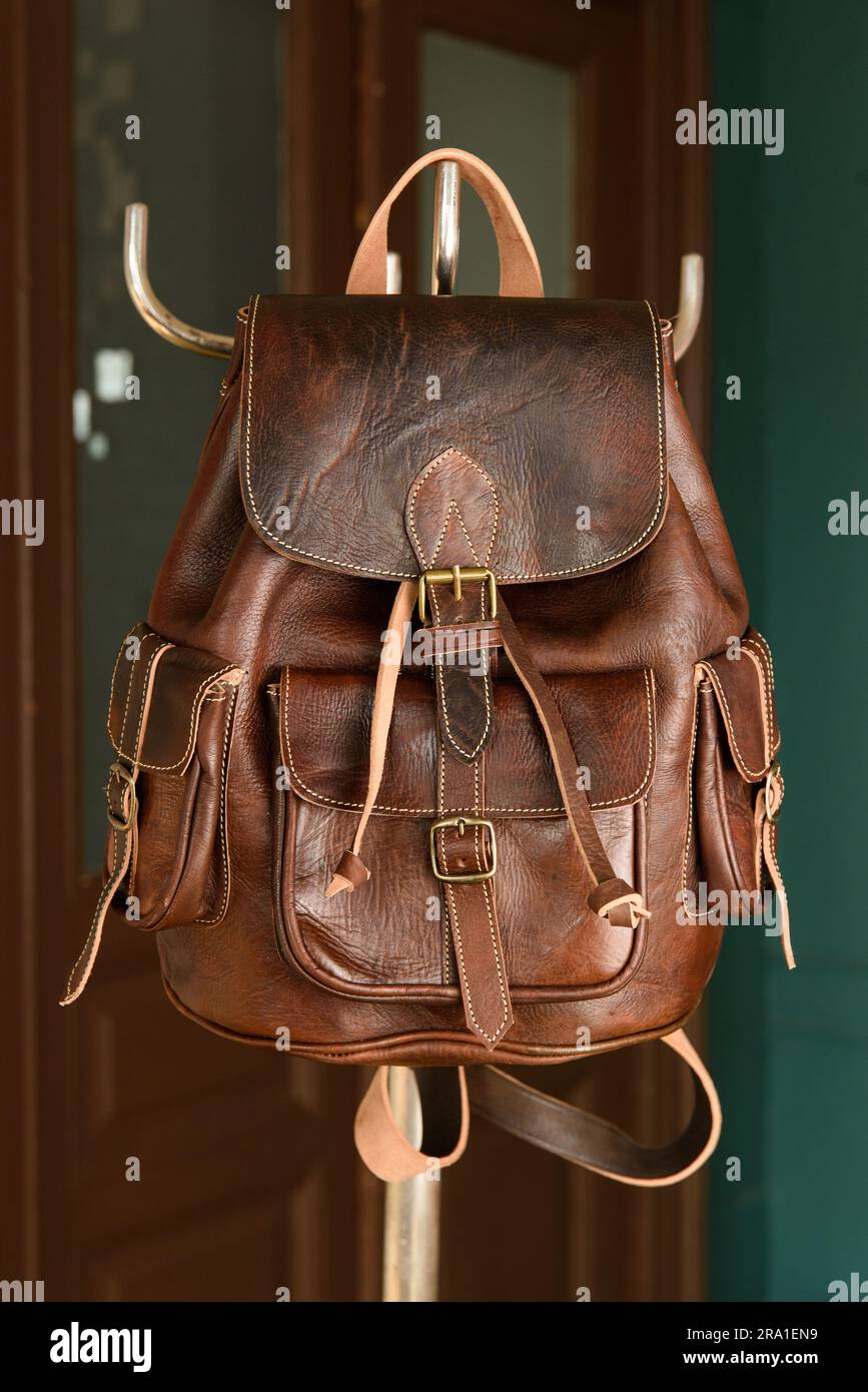 brown leather oldfashioned backpack. indoors photo Stock Photo - Alamy