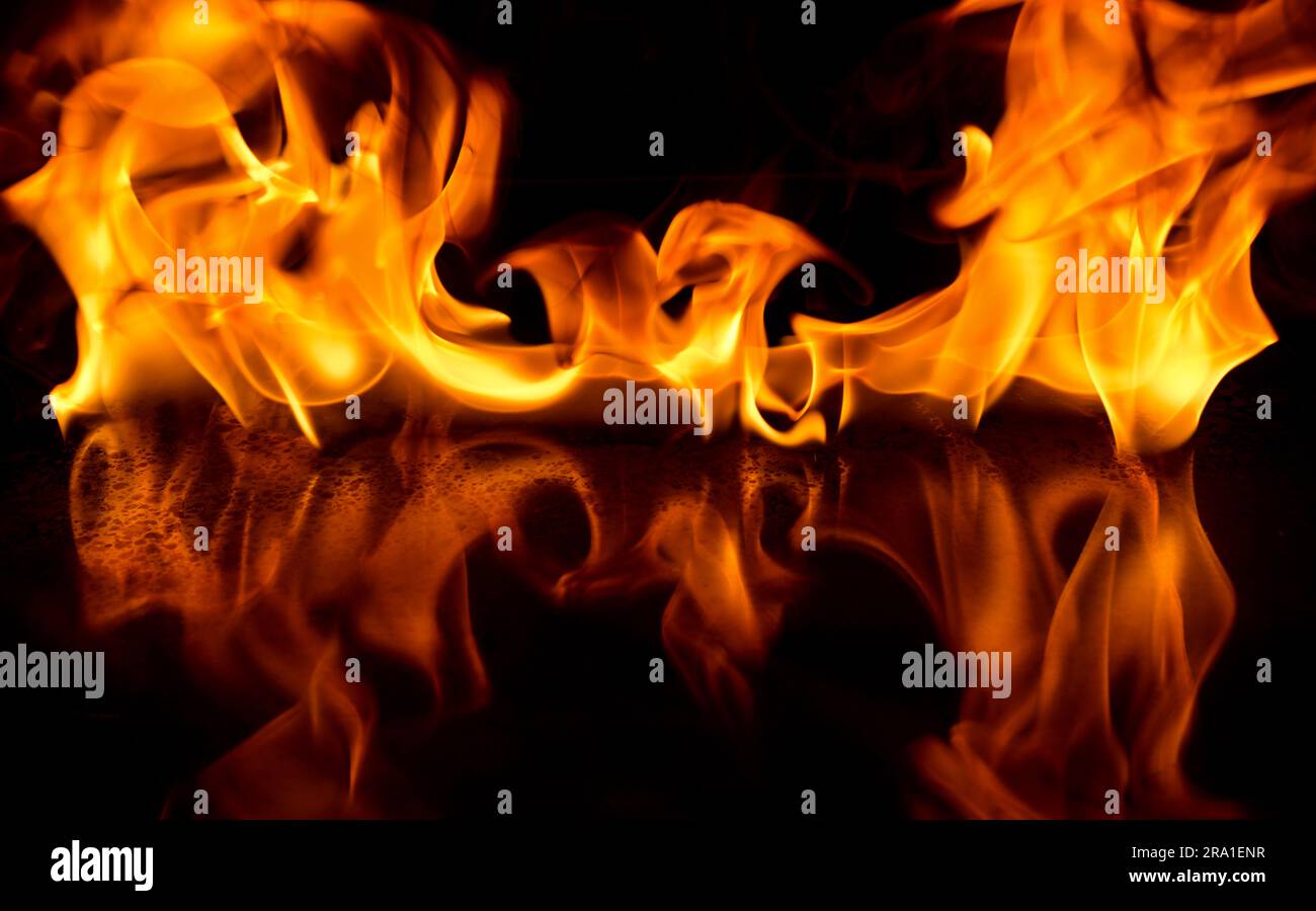 Beautiful Fire Flames On A Black Background Stock Photo - Alamy