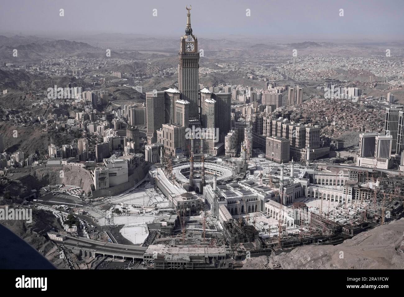 General view showing the clock tower over the Grand Mosque as Muslim ...