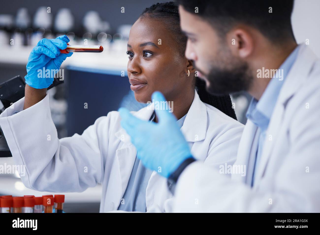 Science, collaboration and scientists with a blood test in a lab ...