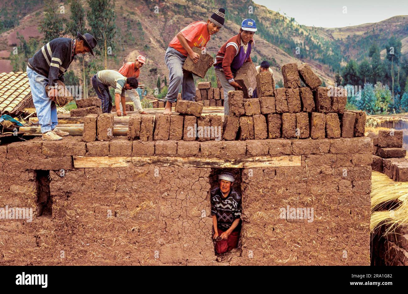 Peru, Cusco region; Use of adobe stones, a mix of clay, sand and small ...