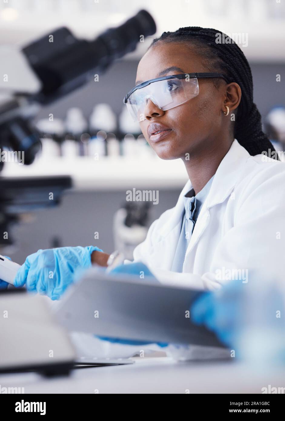 Computer, black woman or scientist reading research for online analysis ...