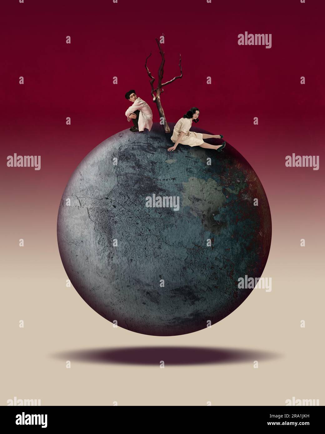 Two people on the earth. Man and woman sitting on sphere near dry tree ...
