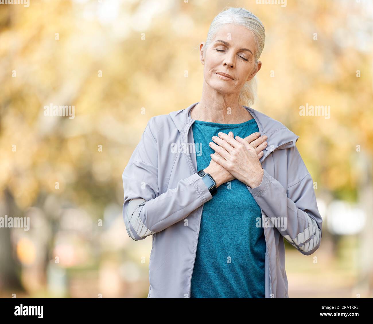 Fitness, heart attack and senior woman on a run for race, marathon or ...