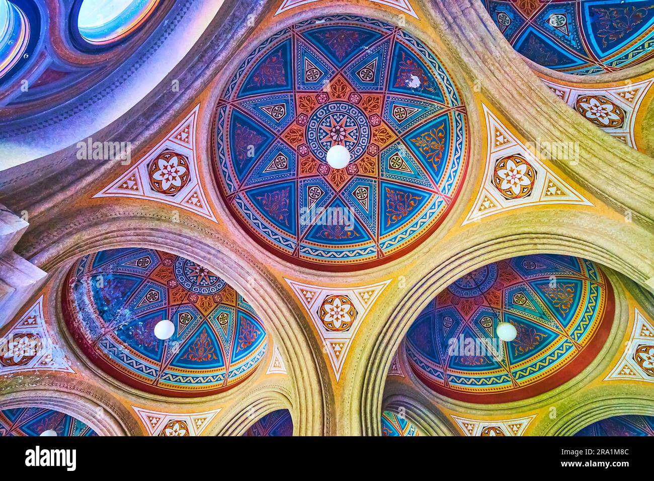 CHERNIVTSI, UKRAINE - JULY 16, 2021: The beautiful small domes with ...