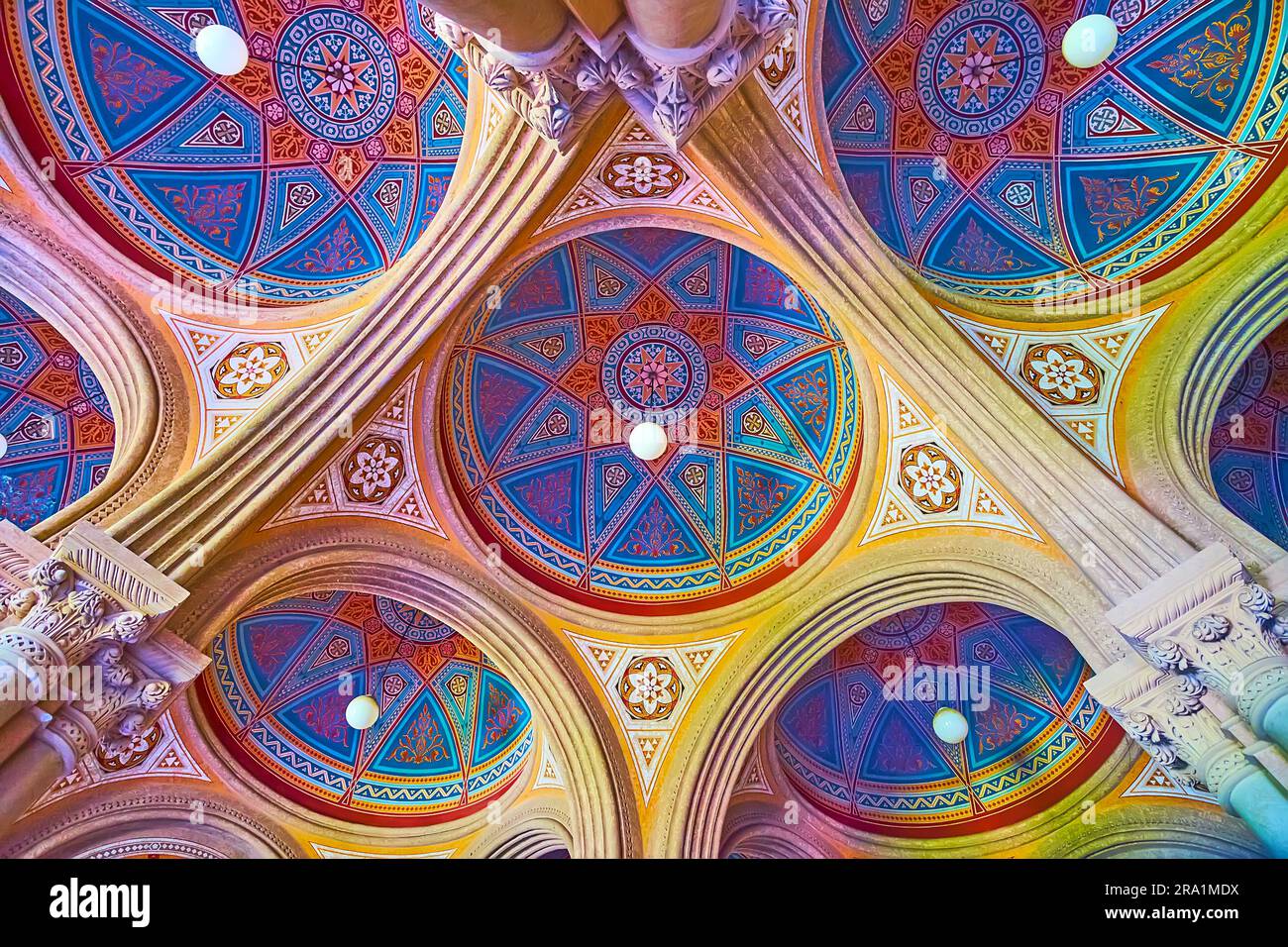 CHERNIVTSI, UKRAINE - JULY 16, 2021: The colored domes with painted ...