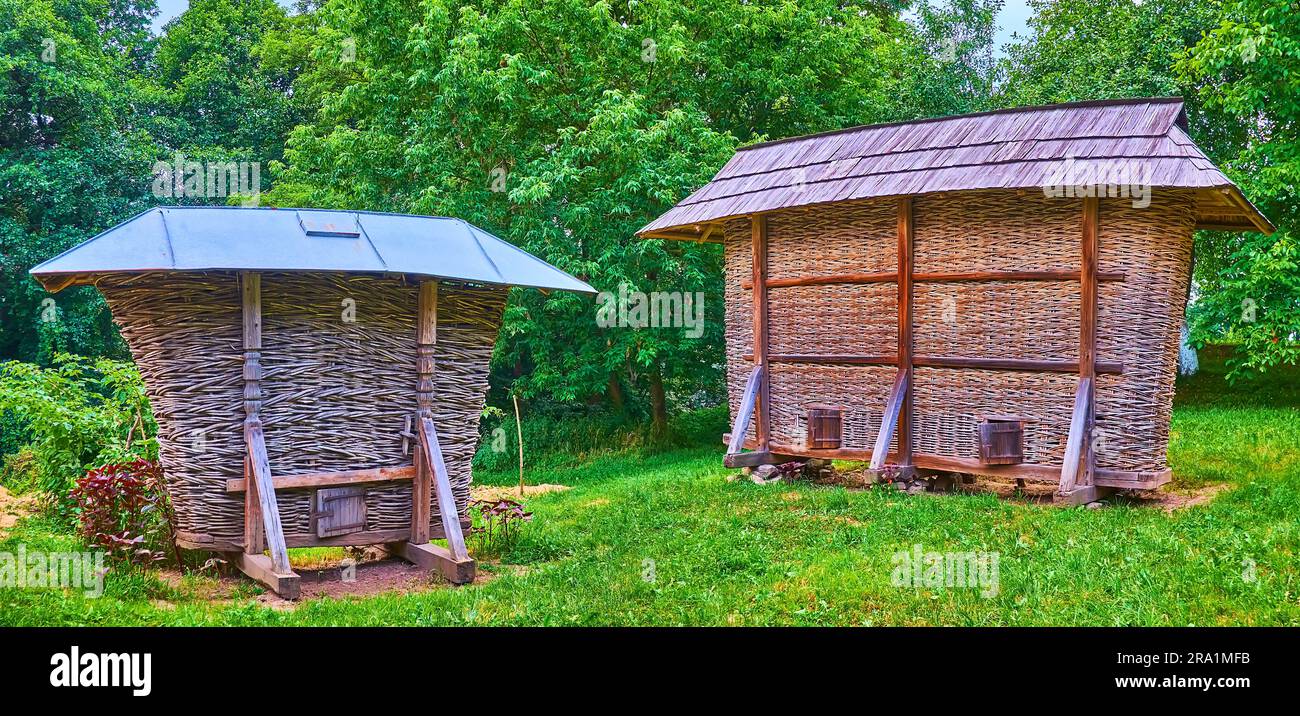 Panorama of the green mown with wicker barns of the vintage mountain ...