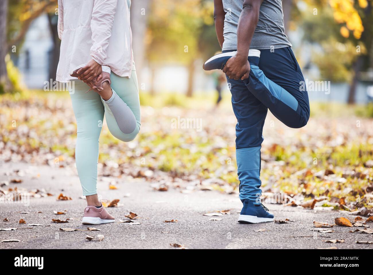 Fitness, couple and stretch with legs in outdoor for workout or sports ...