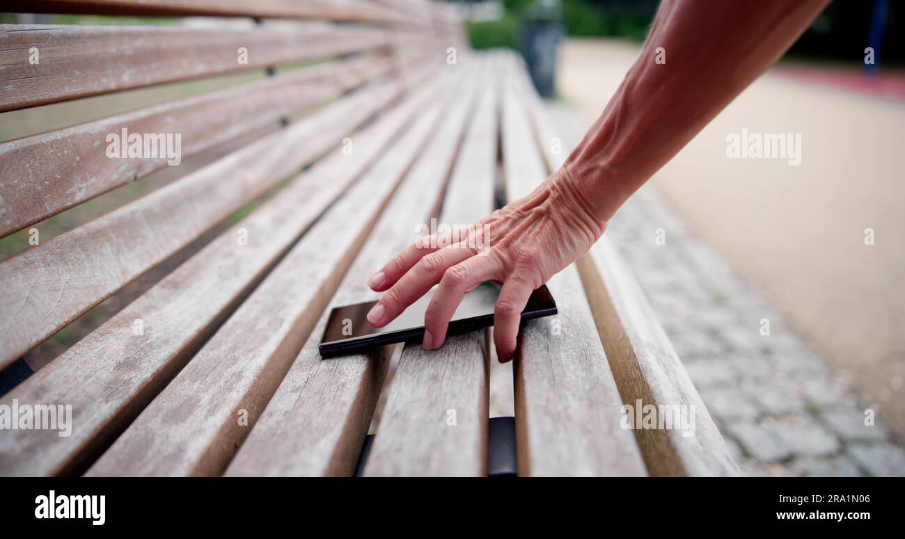 Hand picking up phone hi-res stock photography and images - Alamy