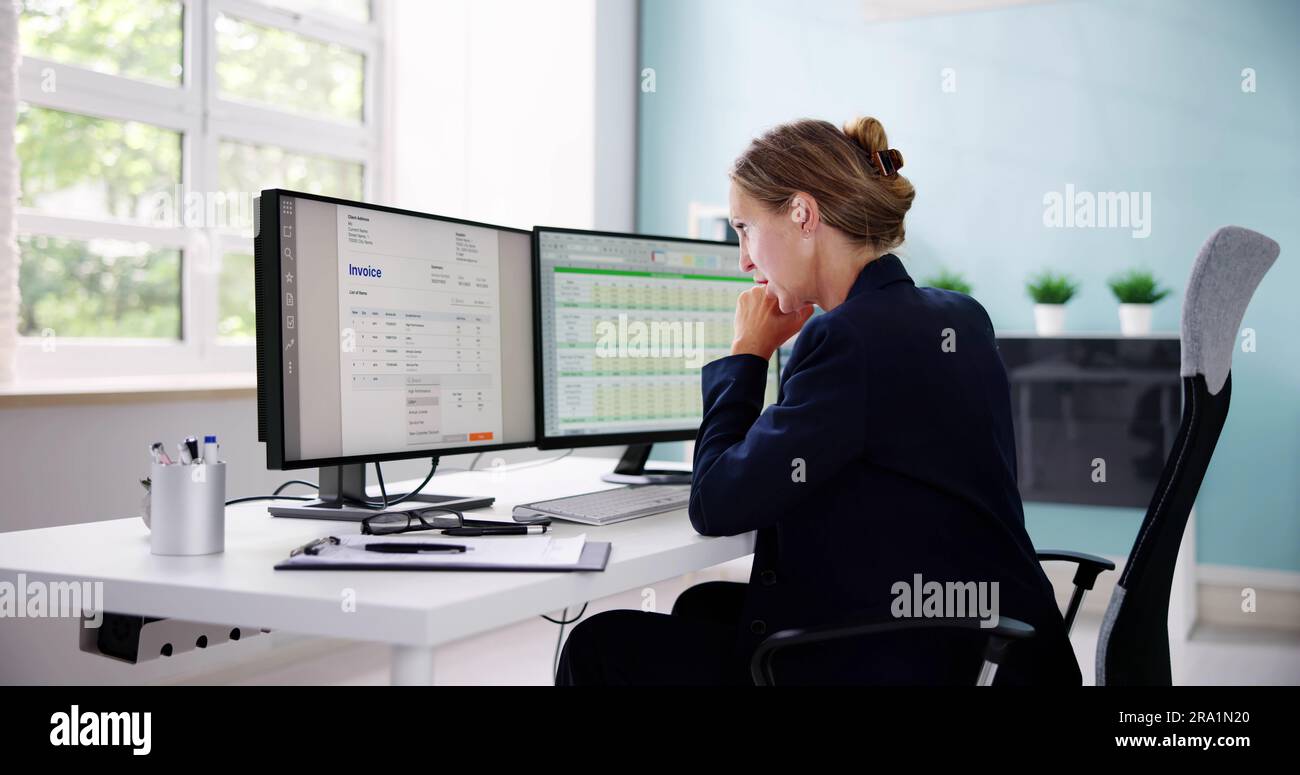 Accountant Using E Invoice Software At Computer In Office Stock Photo ...