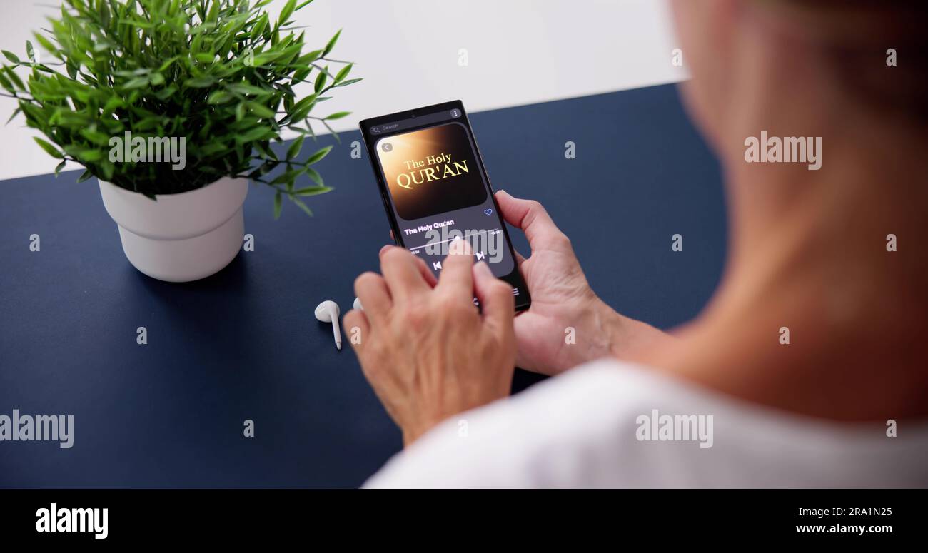 Muslim Woman Reading Quran Book On Phone And Praying Stock Photo - Alamy