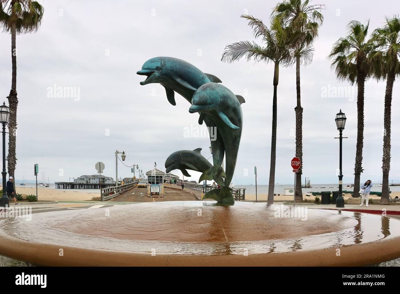 Dolphin fountain sculpture in the Plaza de California at the entrance ...