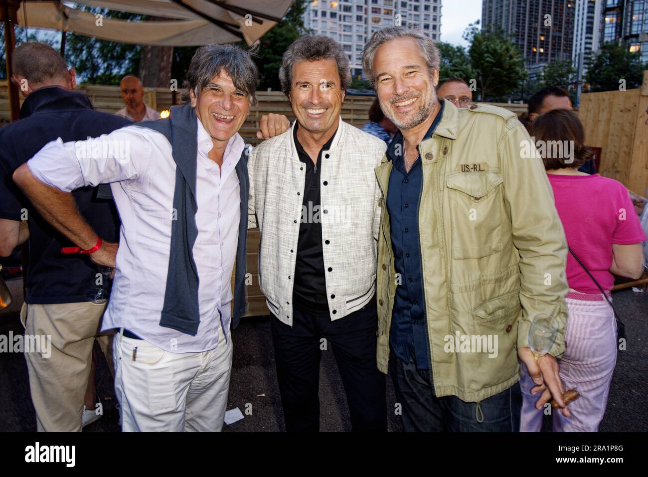 Paris, France. 29th June, 2023. Tex, a guest and Fabrice Deville attend ...