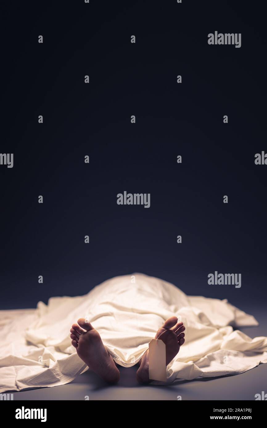 feet of corpse lying on mortuary bench Stock Photo - Alamy