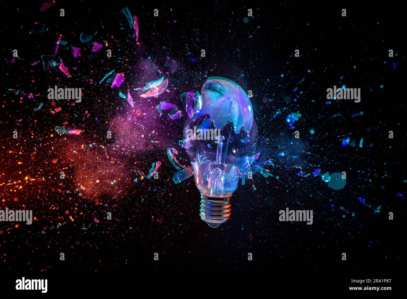 bulb destroying on black background with coloured lights Stock Photo ...