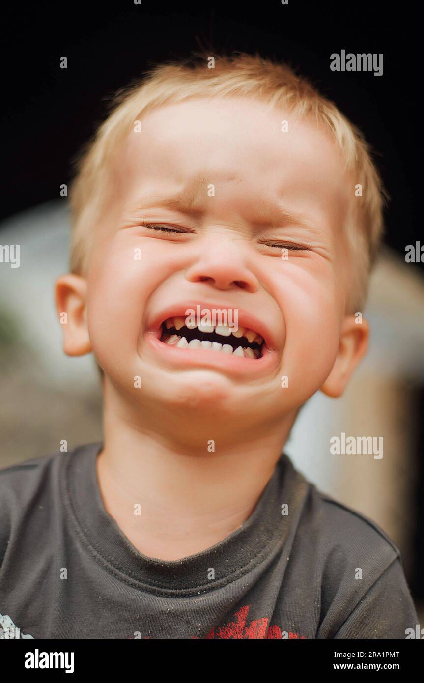 Baby laughing crying hi-res stock photography and images - Alamy