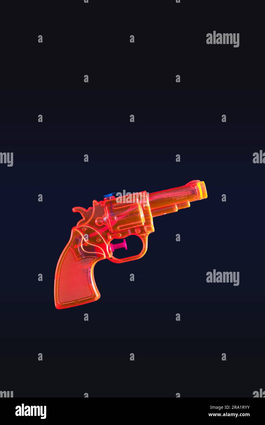 Orange toy gun hi-res stock photography and images - Alamy