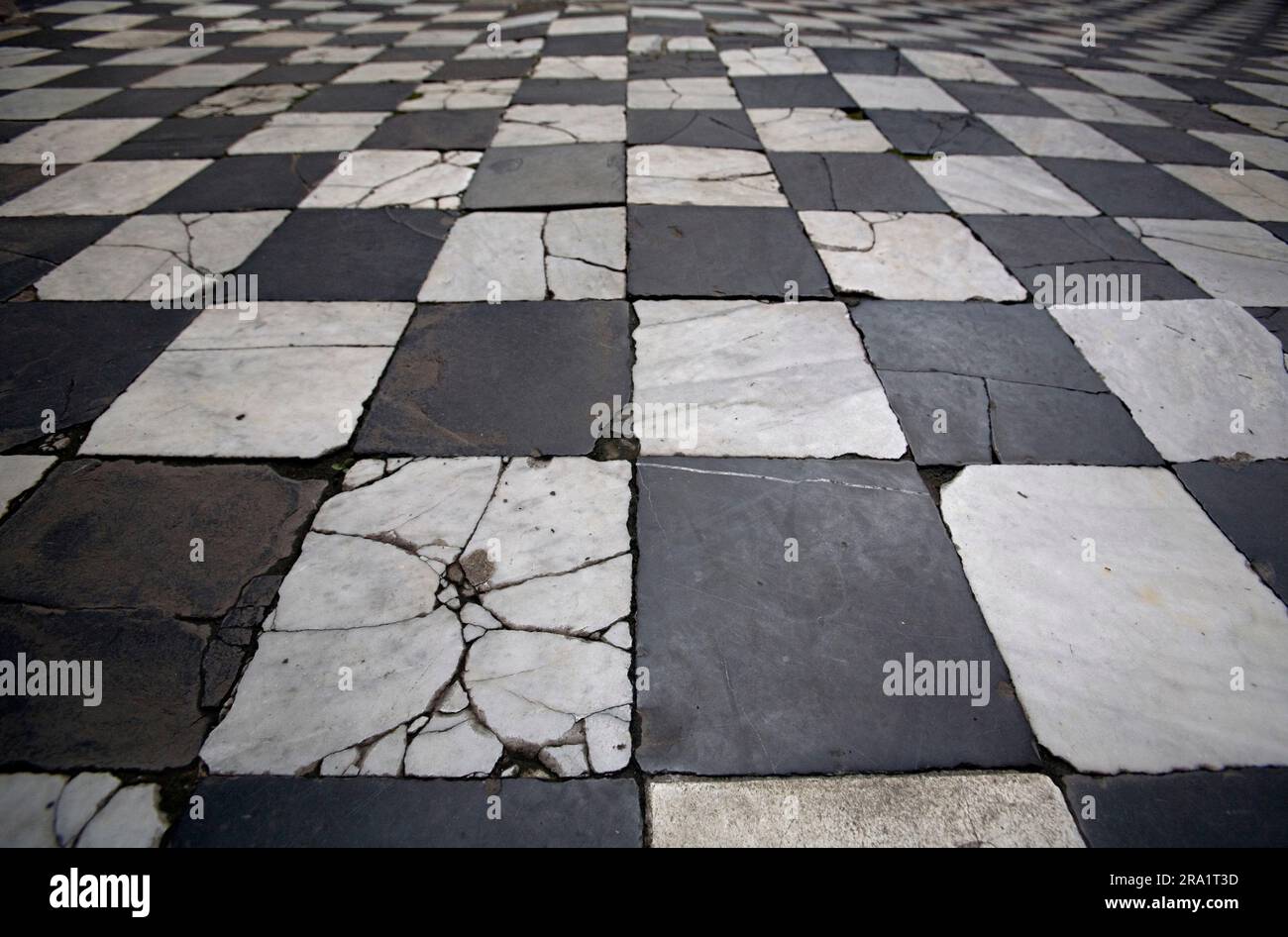 Beautiful tile floor with cracks in a historic square in Argentina ...