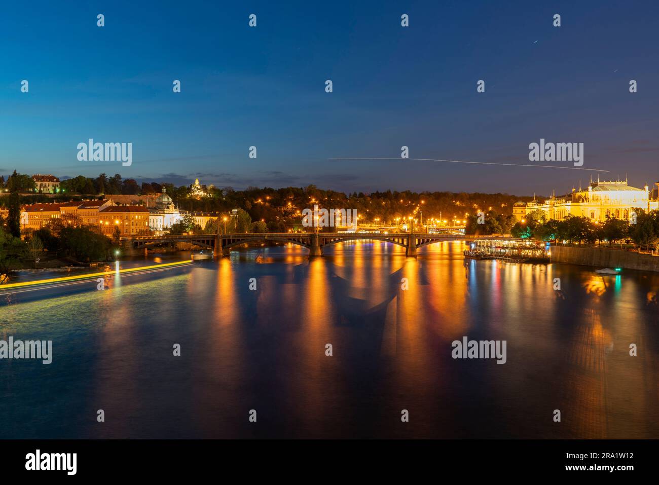 night view of Prague with Manes Bridge and the Czech Philharmonic Stock ...