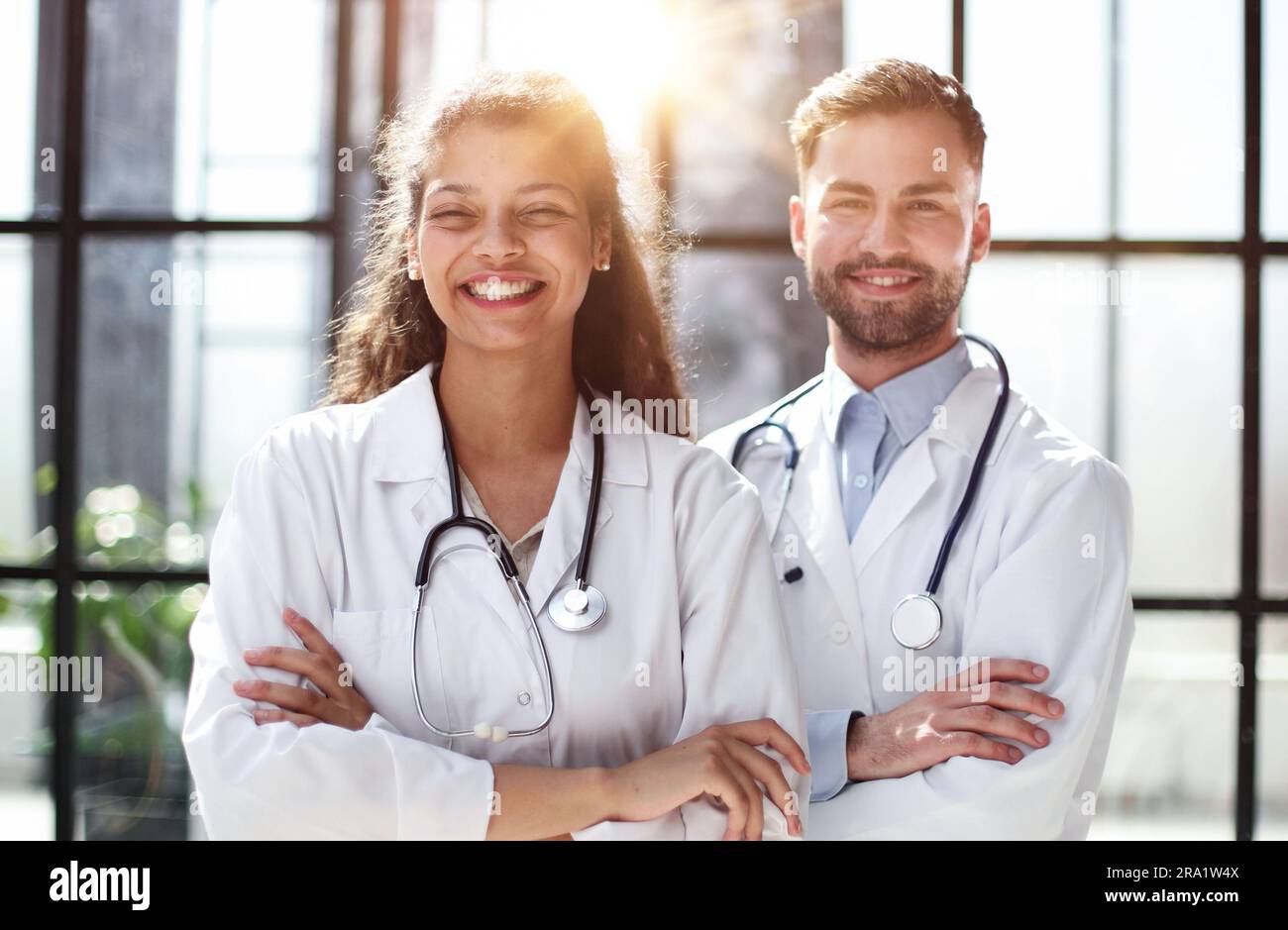 female doctor and male doctor stand in the lobby of the hospital Stock ...