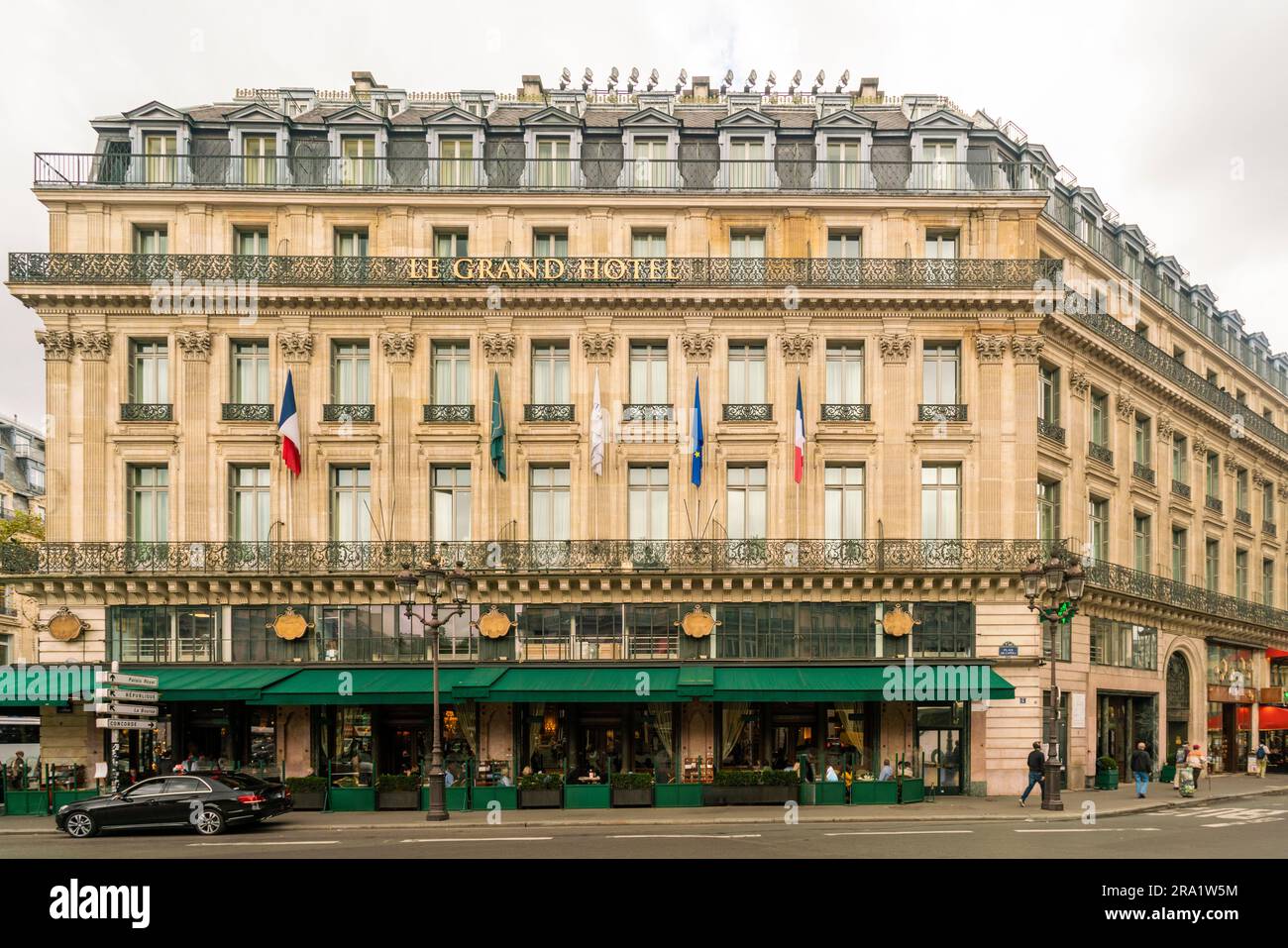 Luxurious restaurants, cafes and hotel by the opera, Paris, France ...
