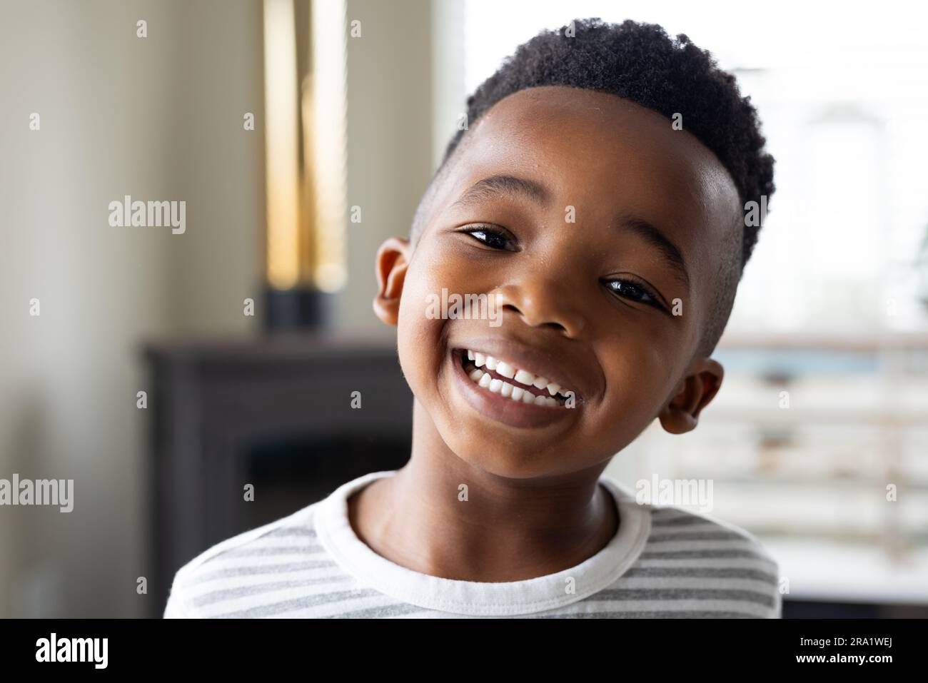 Portrait of happy african american boy looking at camera and smiling ...